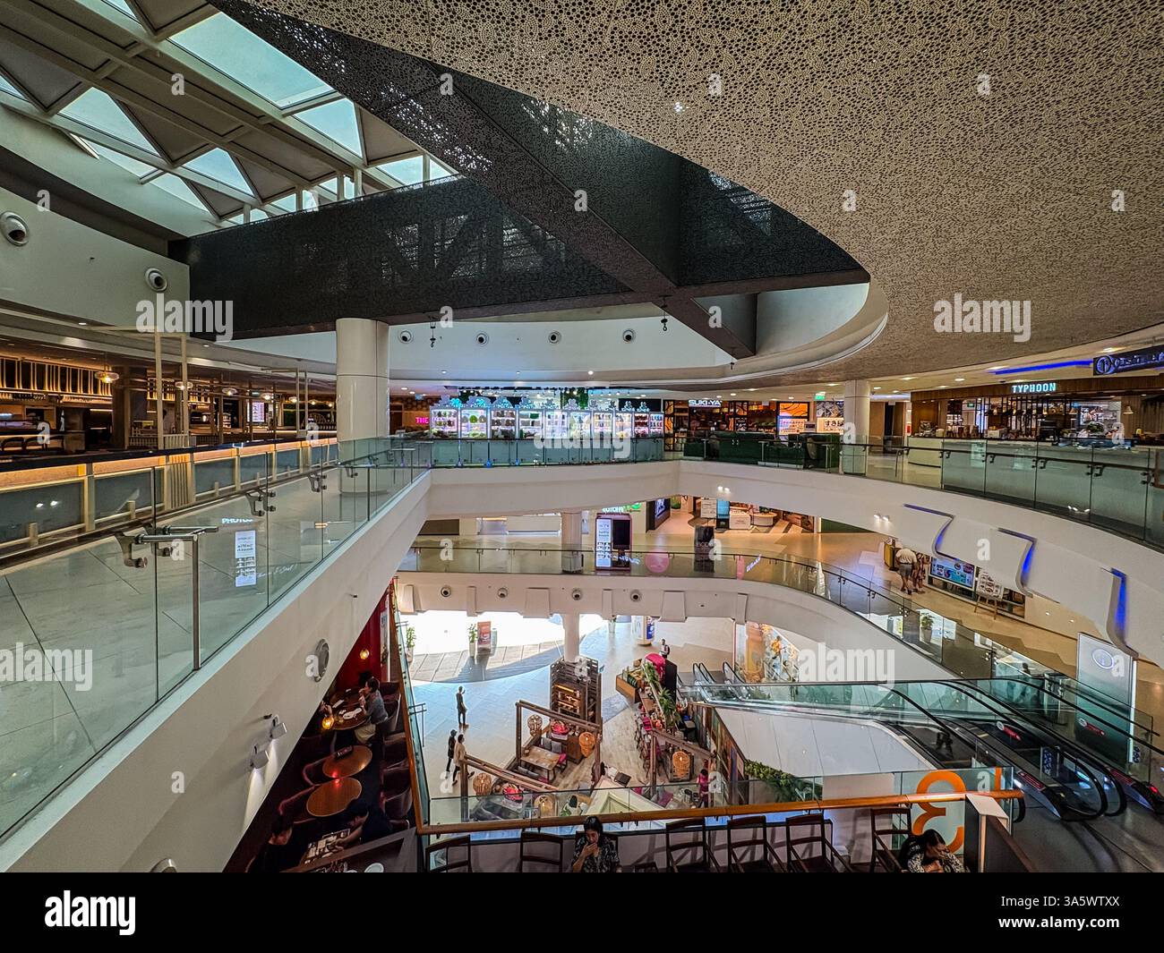 Interior view of the Jewel Changi Airport in Singapore featuring ...
