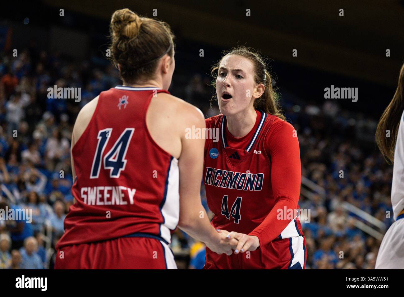 Richmond Spiders forward Maggie Doogan (44) celebrates with guard Ally ...