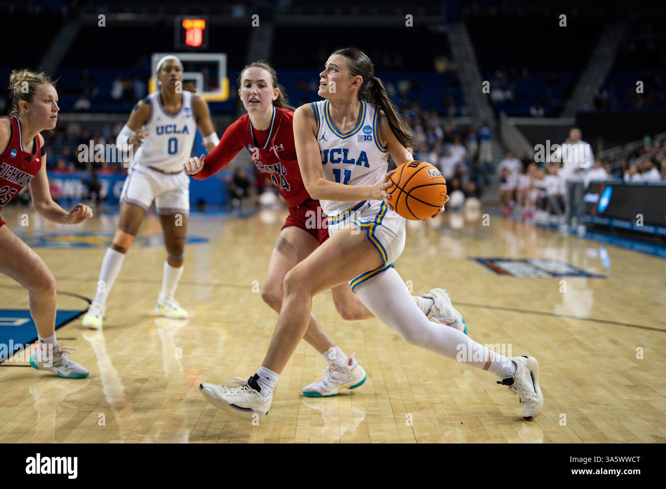 UCLA Bruins guard Gabriela Jaquez (11) drives against Richmond Spiders ...