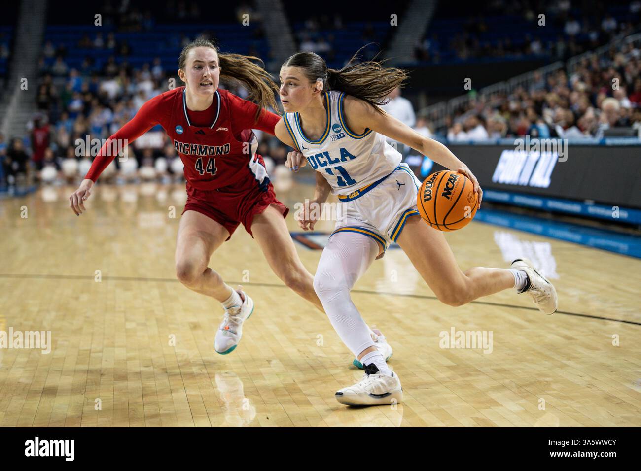 UCLA Bruins guard Gabriela Jaquez (11) drives against Richmond Spiders ...