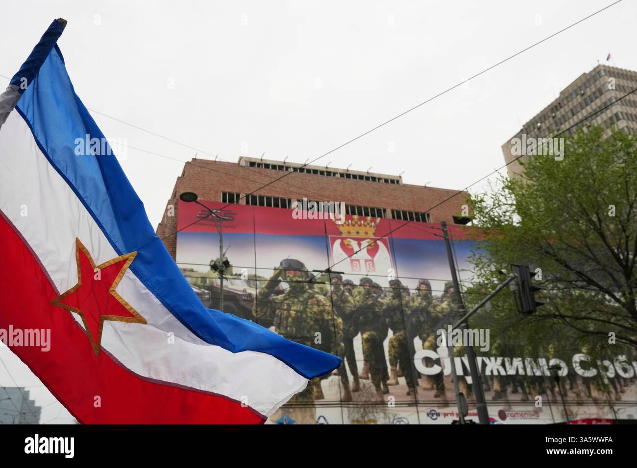 An old Yugoslav flag with the communist five-point star is seen in ...
