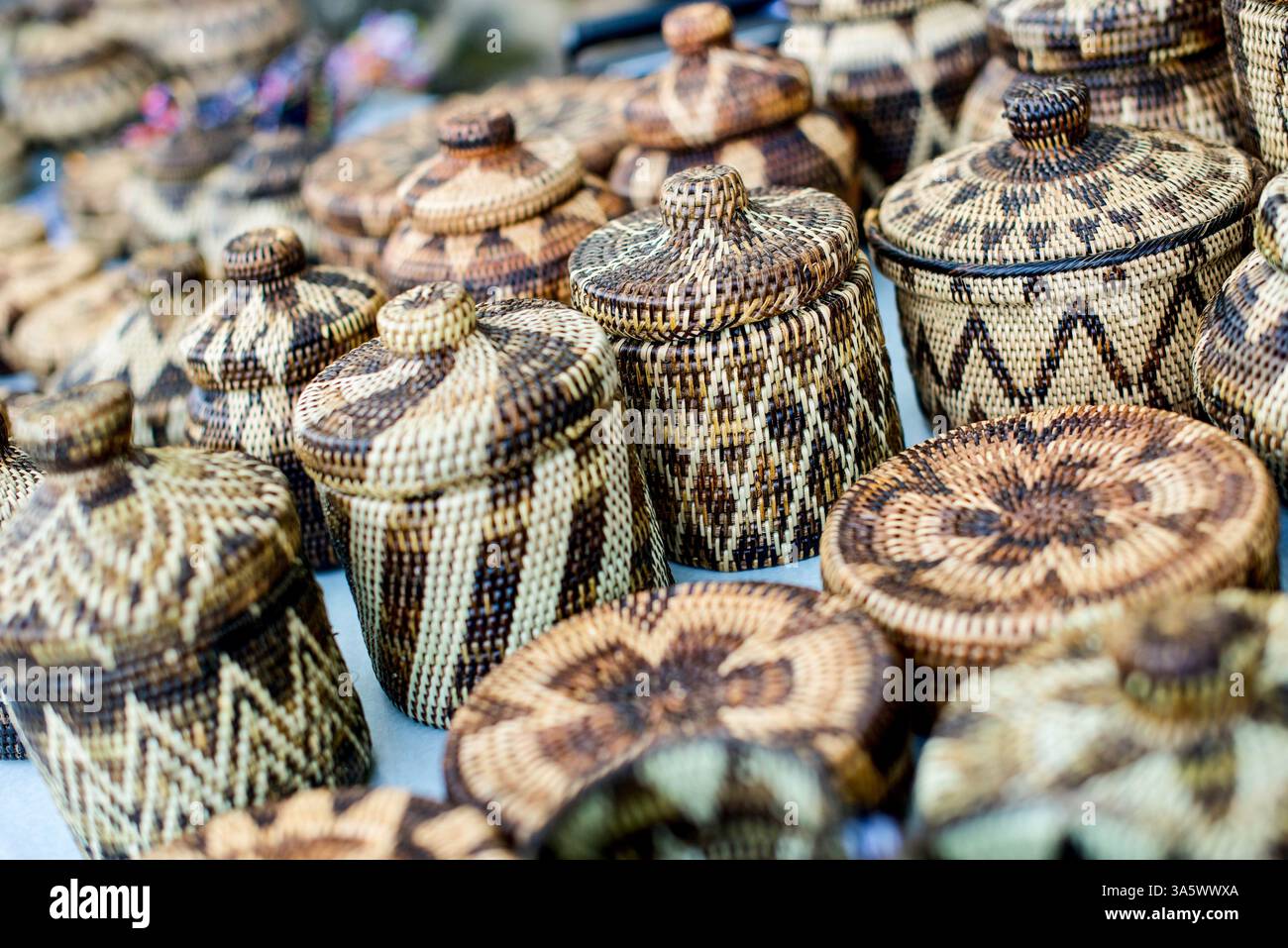 Lea Delos Reyas sells local crafts such as weaved baskets made by the ...