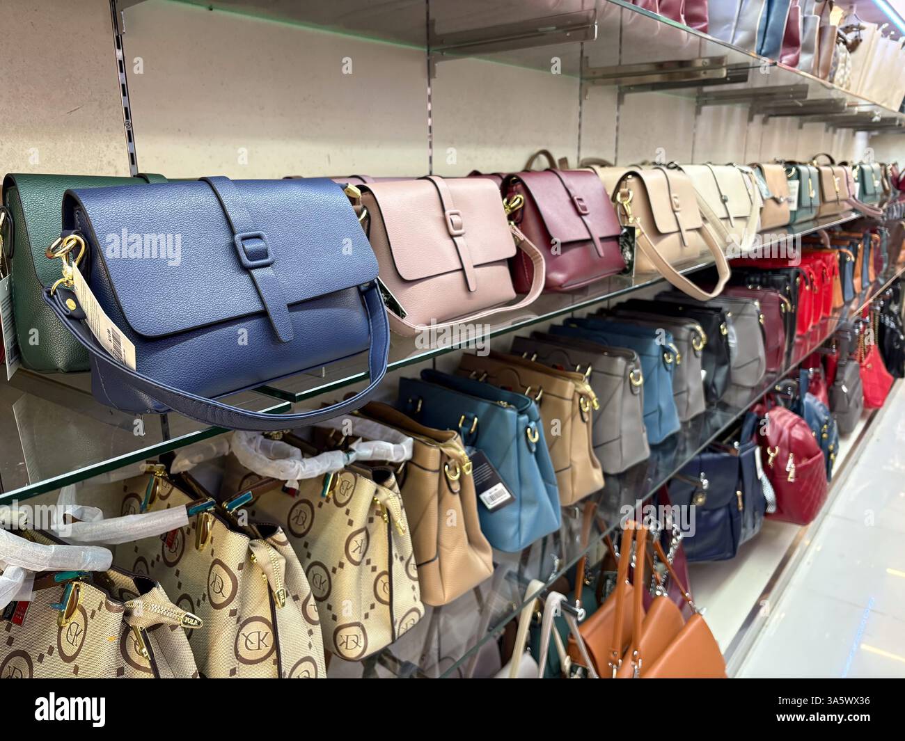 Display of various leather bags at Mustafa Centre in Singapore. Many ...