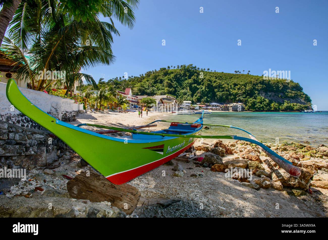 Photo shows the pretty cove at Big La Laguna, Puerto Galera, on Mindoro ...