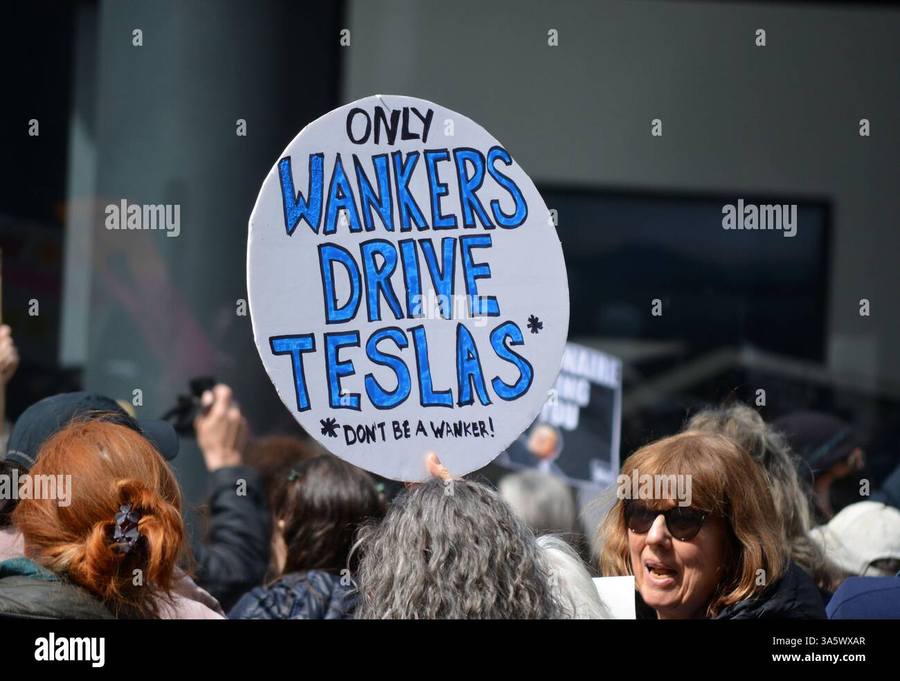 Tesla Takedown rally against Elon Musk and DOGE outside of a Tesla ...