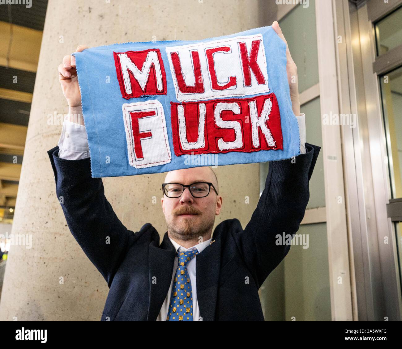 Washington, United States. 24th Mar, 2025. Someone holding a sign ...