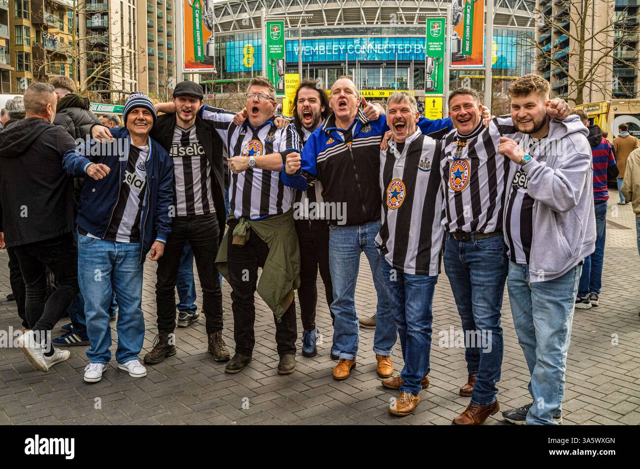 A group of Newcastle United fans pose on their way towards Wembley ...