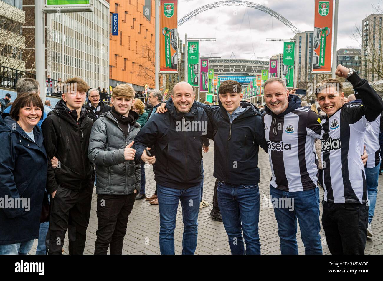A group of Newcastle United fans pose on their way towards Wembley ...