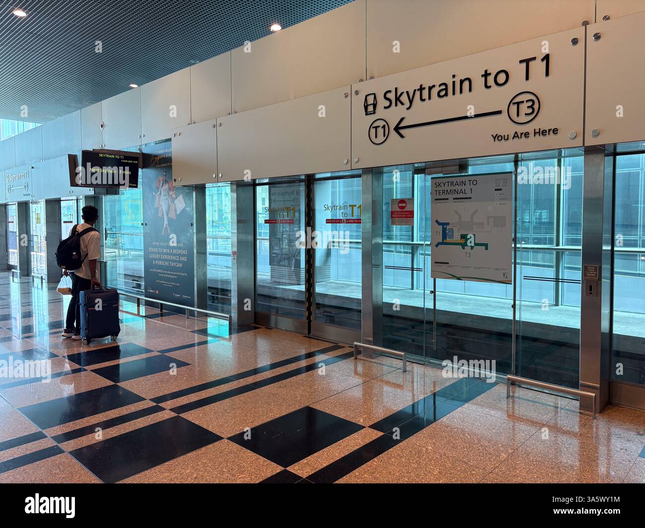Signage for the skytrain to Terminal 1 at Changi Airport in Singapore ...