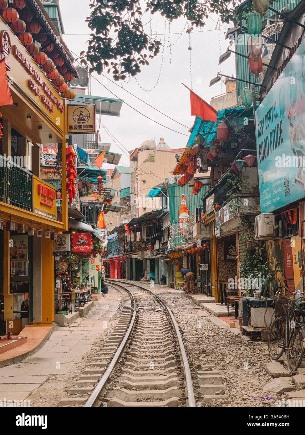 Hanoi train street smartphone stock photos and images - Alamy