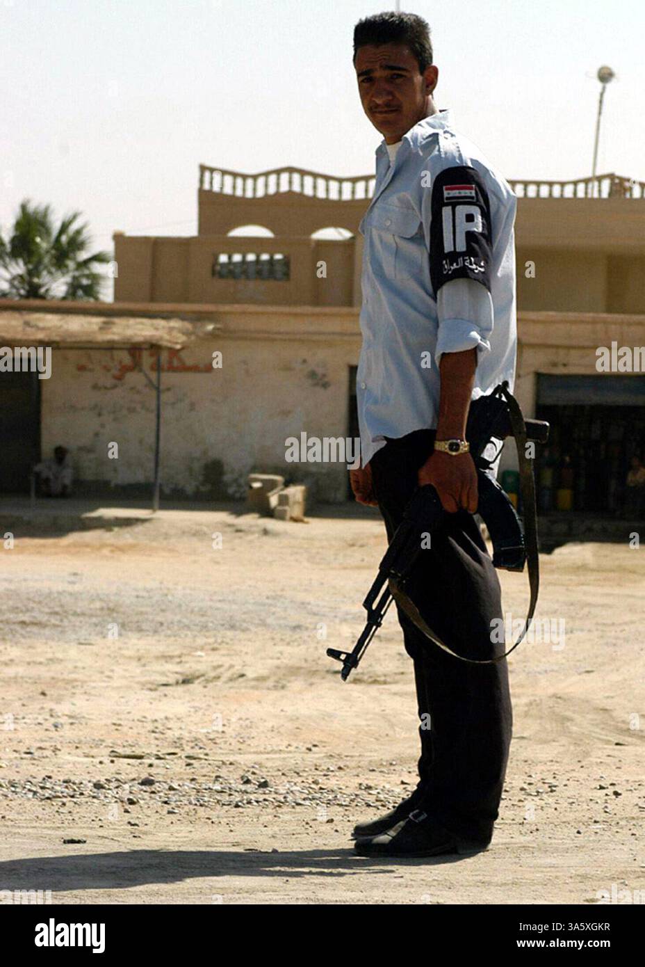 May 29, 2004; Khaldiya, Iraq; KARIM ABRAHIM, an Iraqi policeman from ...