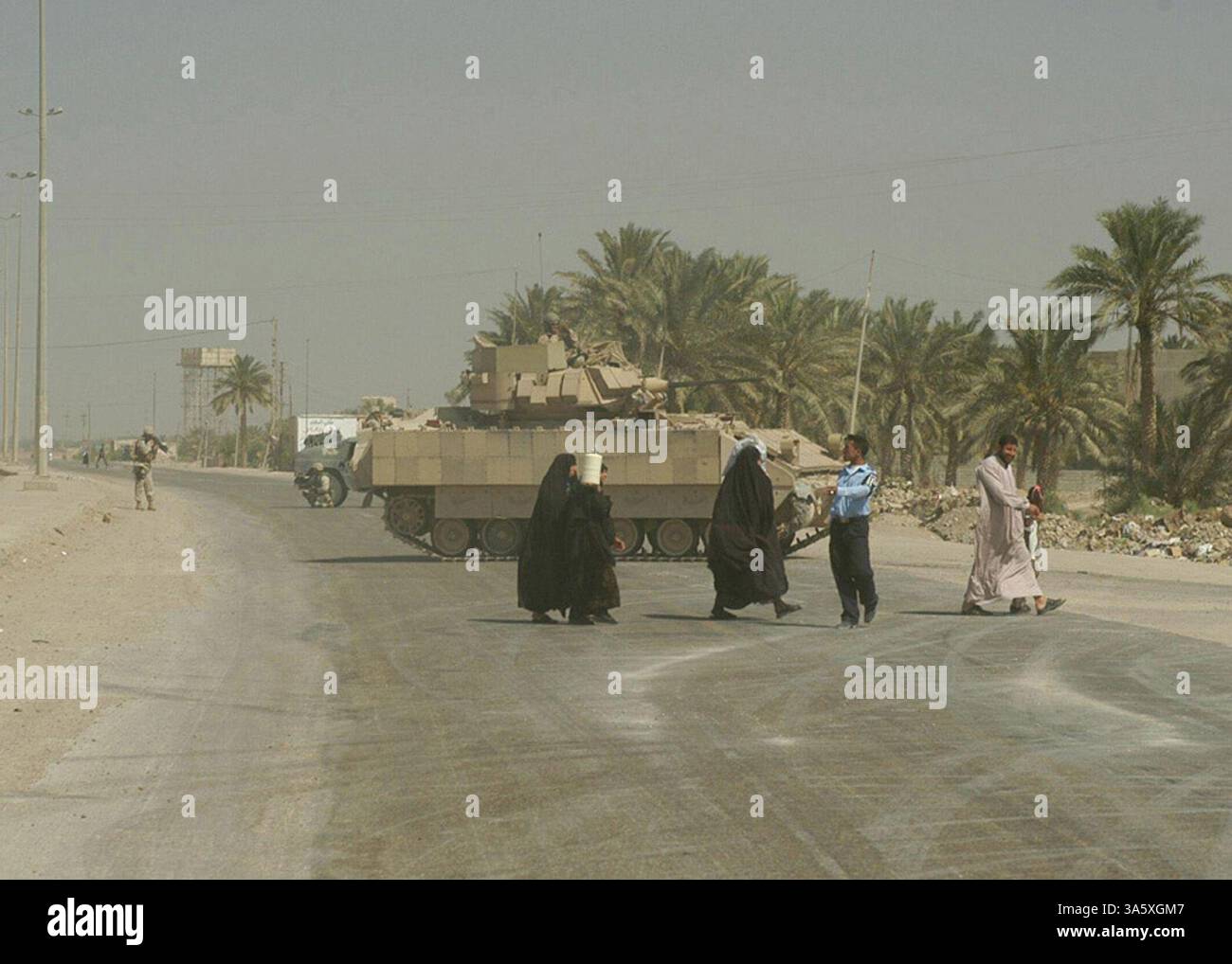 May 29, 2004; Khaldiya, Iraq; Local Iraqi citizens stop to talk to the ...