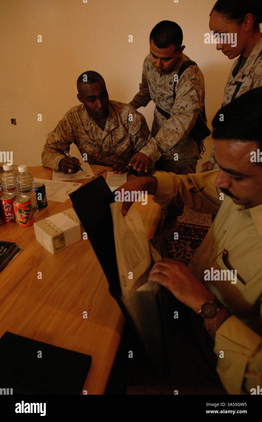 Jun 04, 2004; Camp Habbaniyah, Iraq; From left to right, Maj. ROLLIN F ...