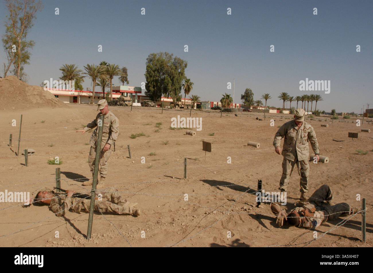 Jun 05, 2004; Camp Ramadi, Iraq; Army Staff Sgts. RICHARD A. DYCUS ...