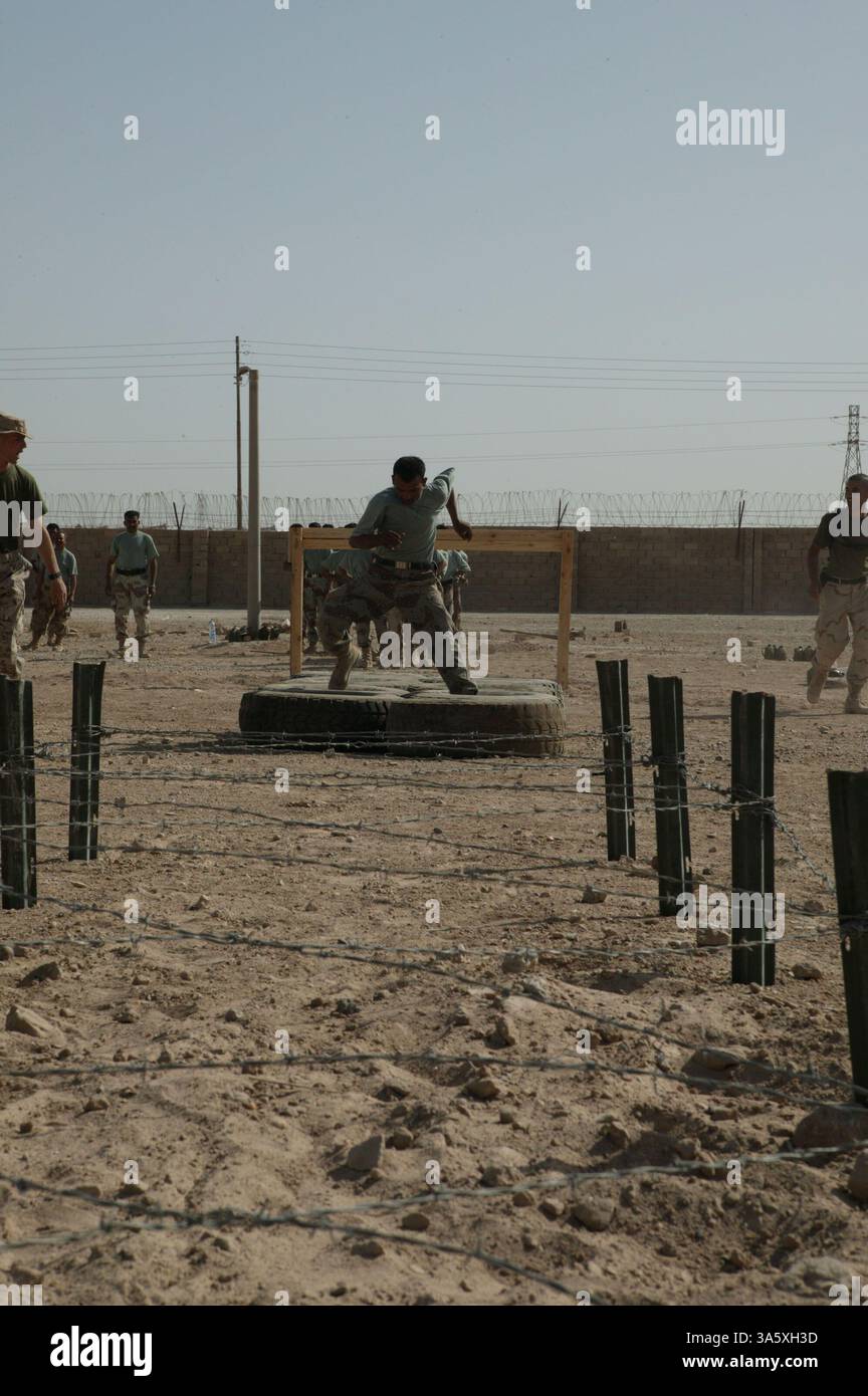 Jun 05, 2004; Camp India, Iraq; An Iraqi Civil Defense Corps soldier ...