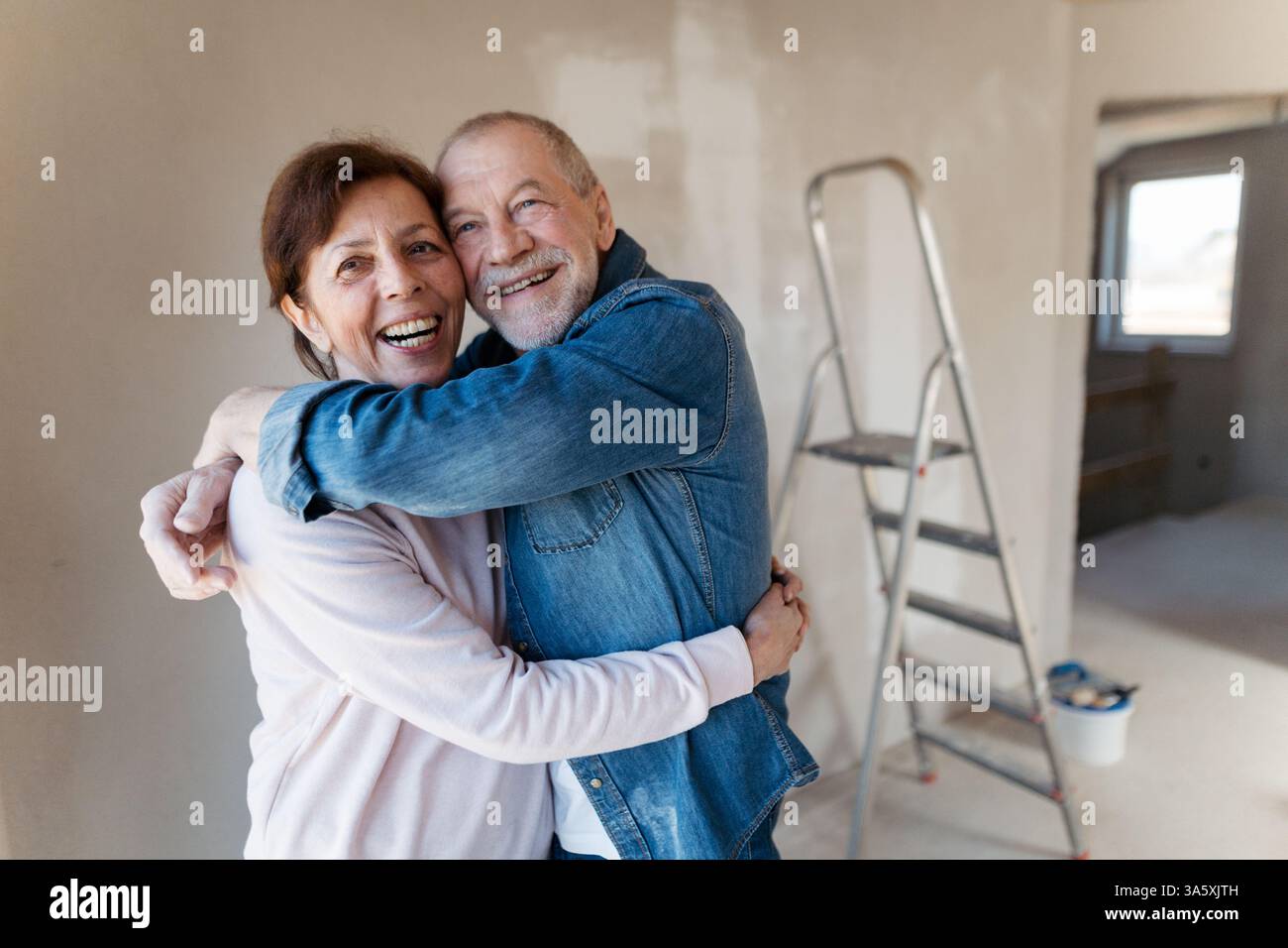 Senior couple renovating their home, a shared retirement activity Stock ...