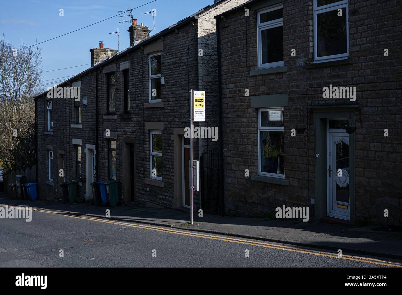 A ‘Bee Network’ Bus Stop in the town of Mossley, Greater Manchester, UK ...