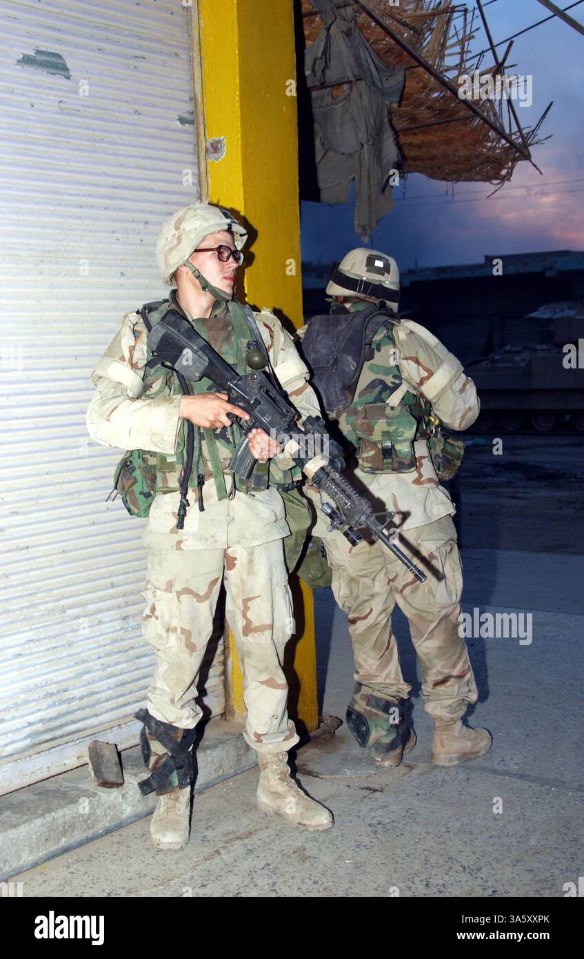 Nov 08, 2004; Fallujah, Iraq; U.S. Two U.S. Army soldiers pause at the ...
