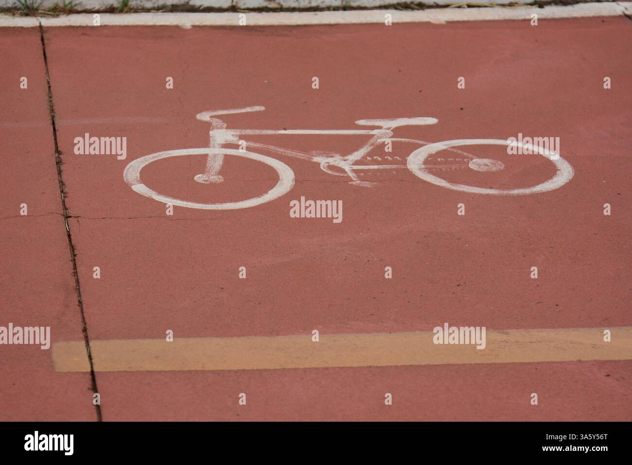 Walking track with bicycle markings Stock Photo - Alamy