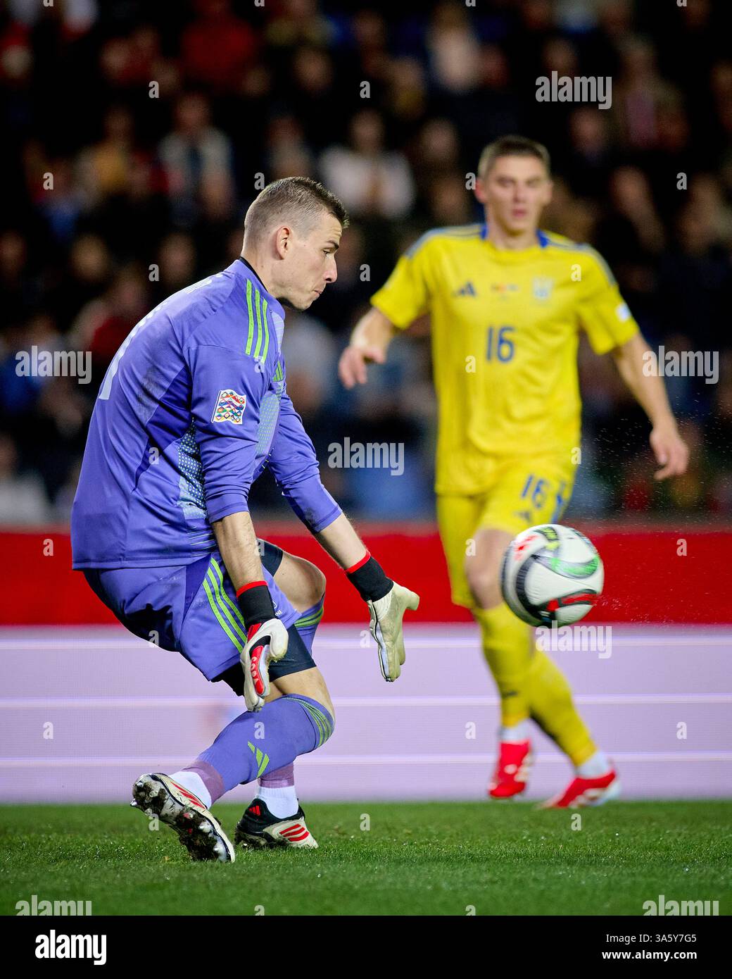 GENK, BELGIUM - 23 MARCH, 2025: Andriy Lunin - The football match of ...