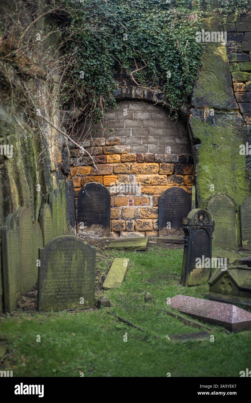 Bricked up catacombs at St James's Cemetery, an urban park behind ...