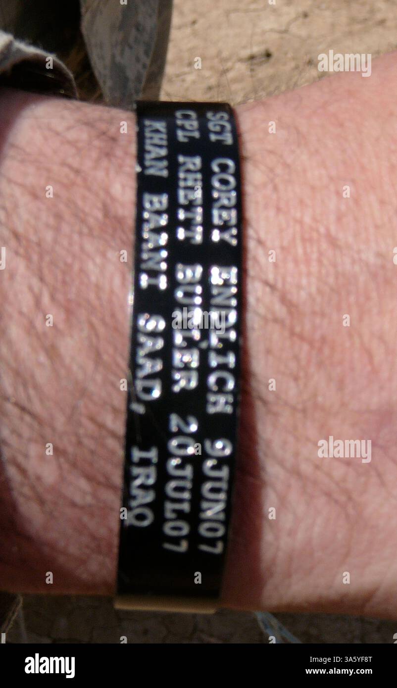 March 4, 2008 - A U.S. soldier in Iraq wears a bracelet in memorial to ...