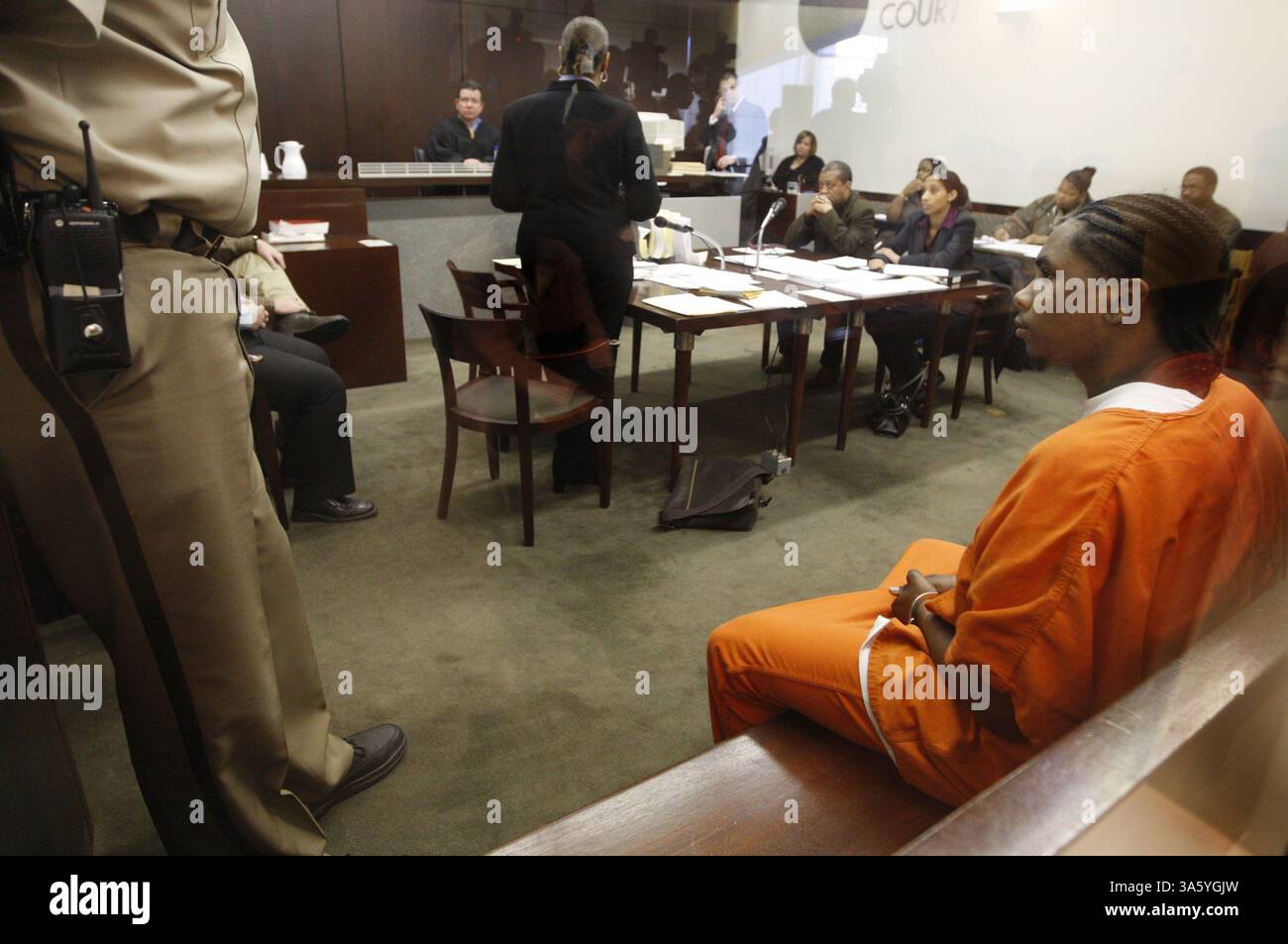 March 14, 2008 - Laurence Alvin Lovette, center, is escorted into the ...