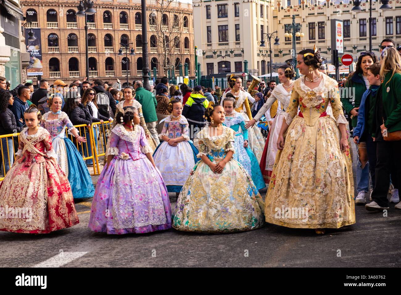 Valencia,Spain-March 16,2025: People watch children in typical costumes ...