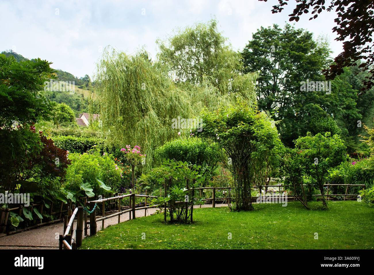 Walking path in Monet's garden on a summer day in Giverny, France Stock ...