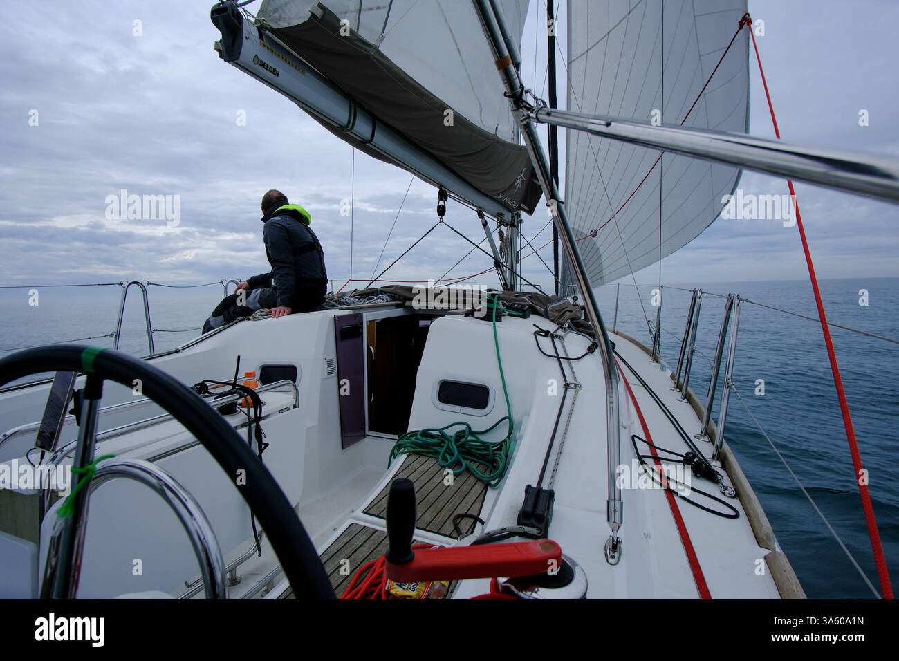22 March 2025 - Sailing in the English Channel with full sails up on a small yacht on a calm day ...