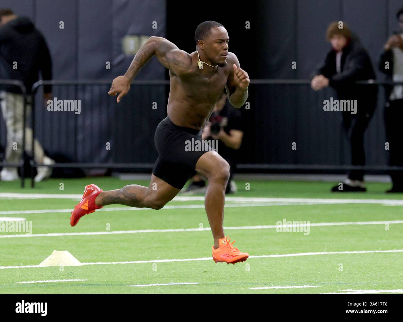 Boston College running back Kye Robichaux runs the 40 yard dash at an ...