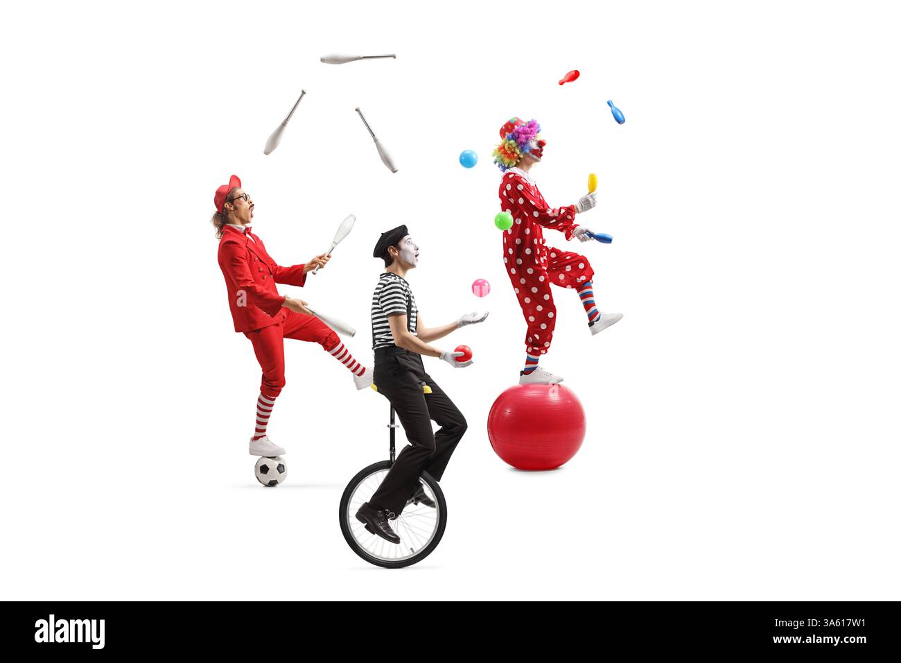 Group of entertainers juggling isolated on white background Stock Photo - Alamy