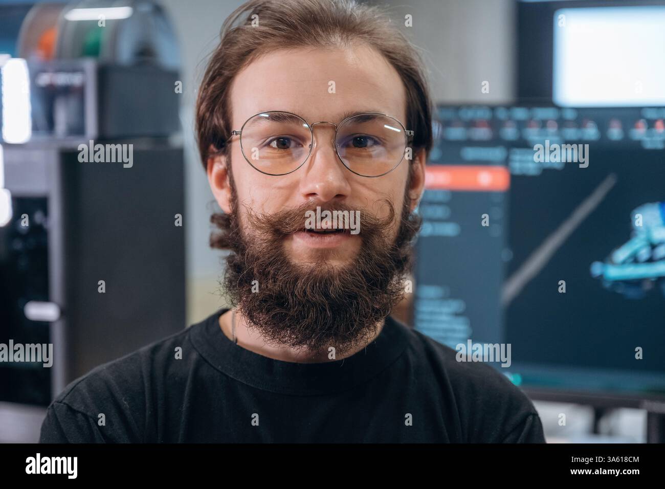 Portrait of man that is in the modern office, 3d printing designer ...