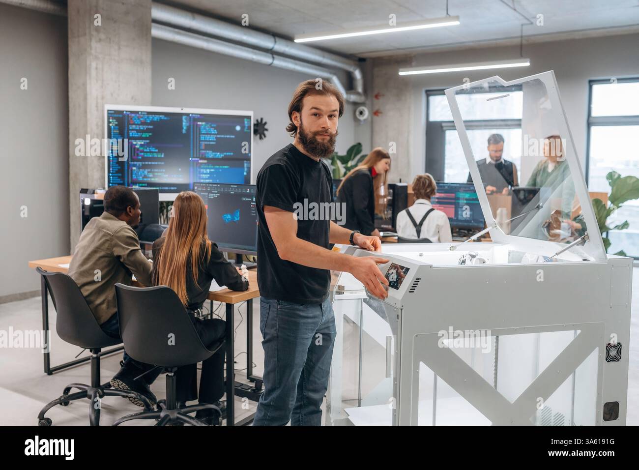 People are in the office by the 3d printer Stock Photo - Alamy
