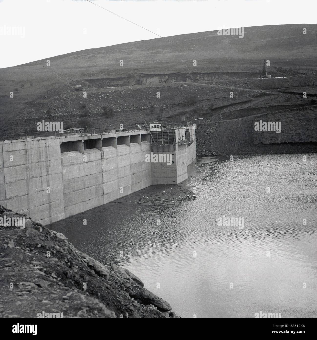 1960s, historical, new concrete built dam under construction ...