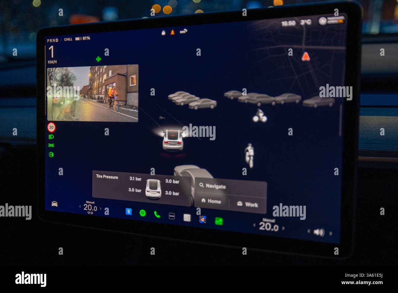 Tesla Model Y touchscreen displaying autopilot interface with cyclist ...