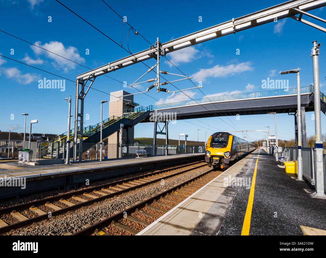 Scotrial train passing railway line station platform, East Linton, East ...