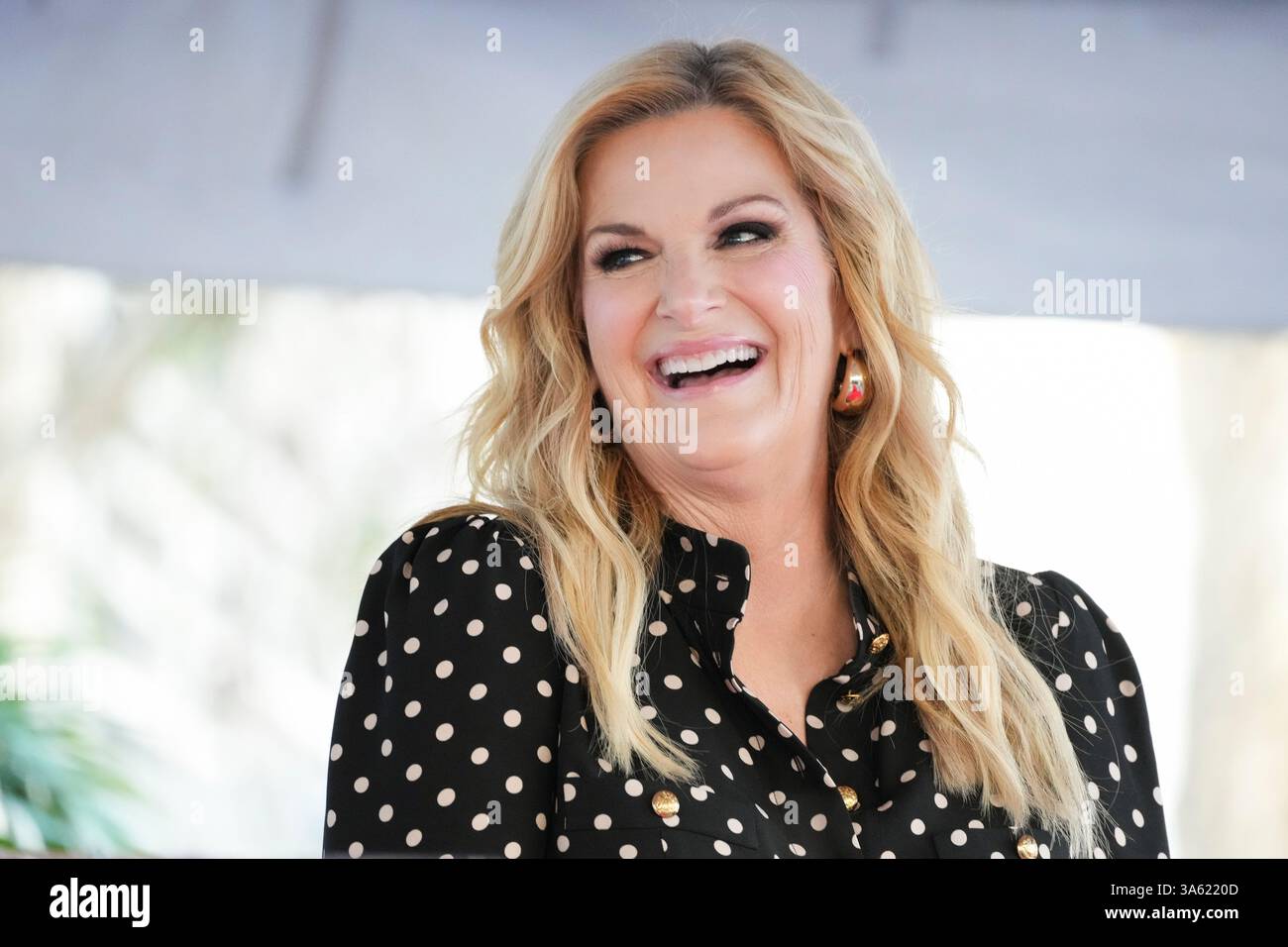 Trisha Yearwood attends a ceremony honoring her with a star on the ...