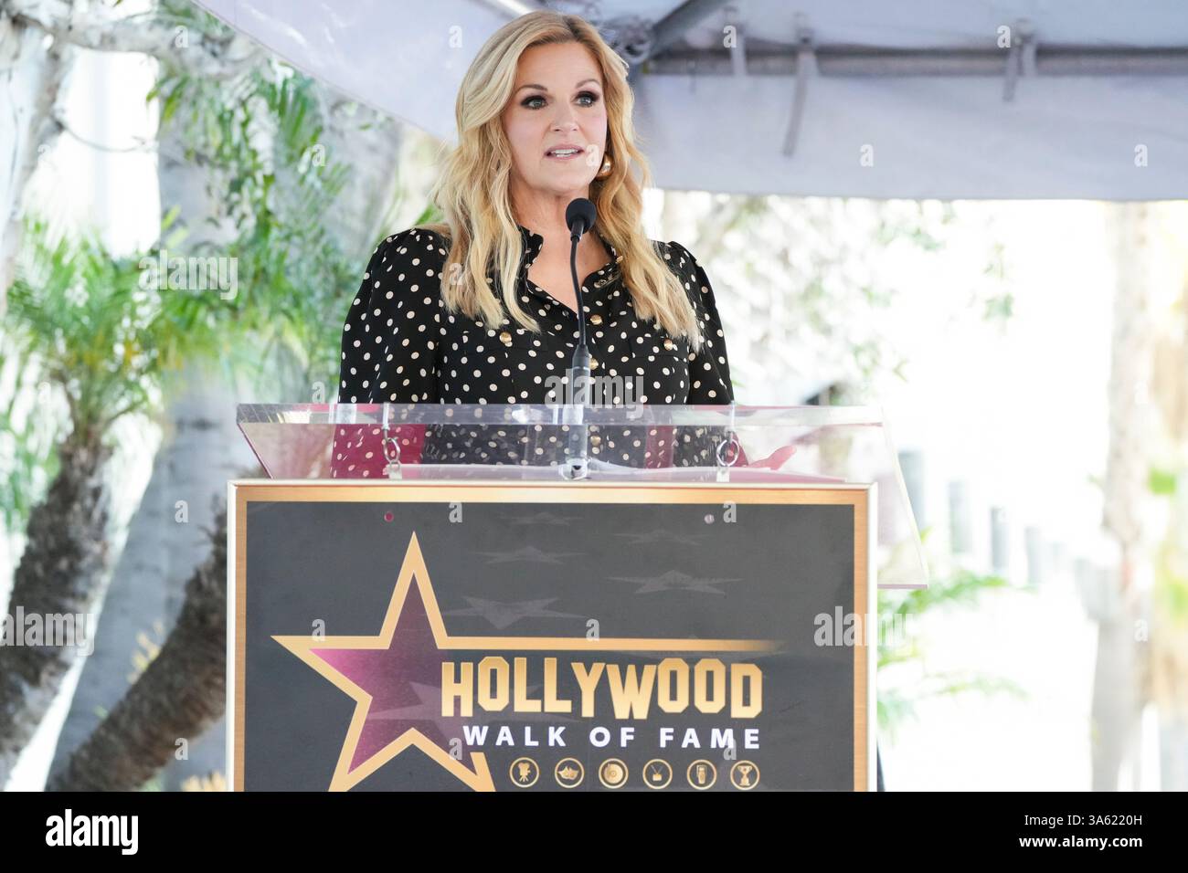 Trisha Yearwood speaks at a ceremony honoring her with a star on the ...
