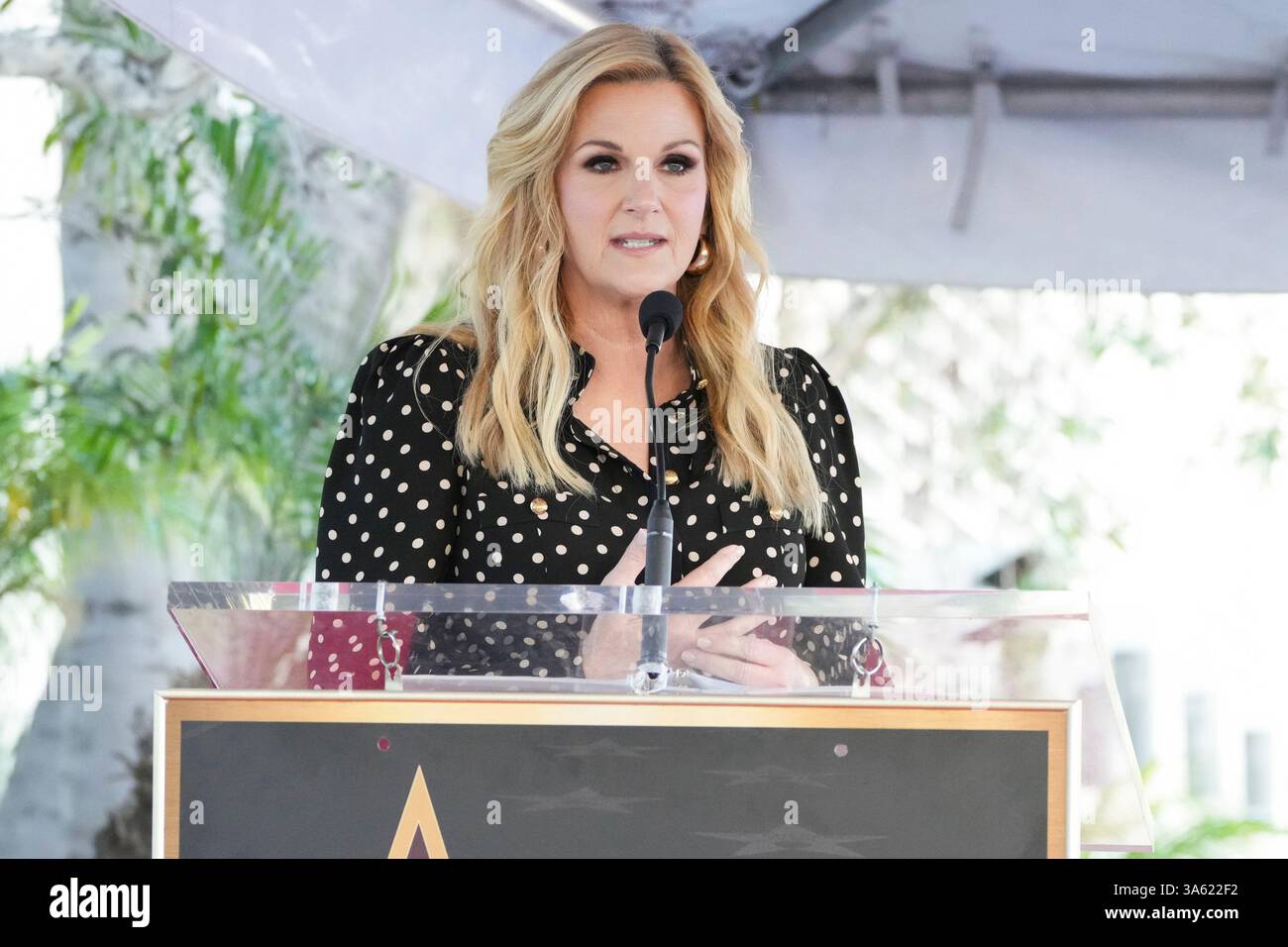 Trisha Yearwood speaks at a ceremony honoring her with a star on the ...