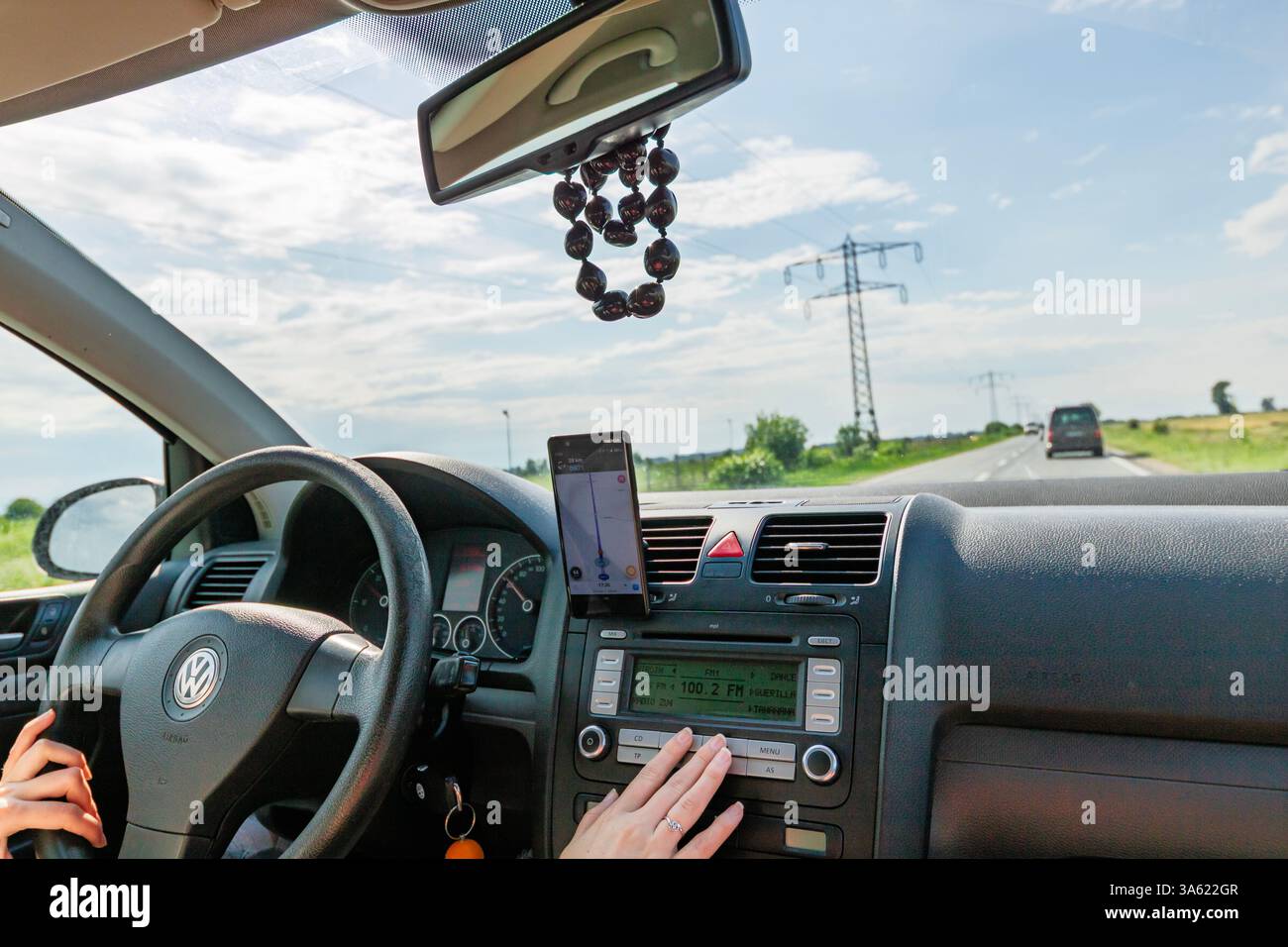 Using Waze maps application on smartphone on car dashboard Stock Photo ...