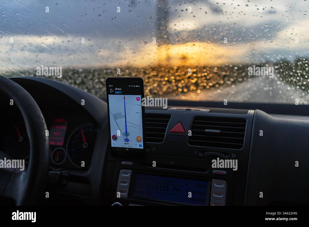 Using Waze maps application on smartphone on car dashboard Stock Photo ...