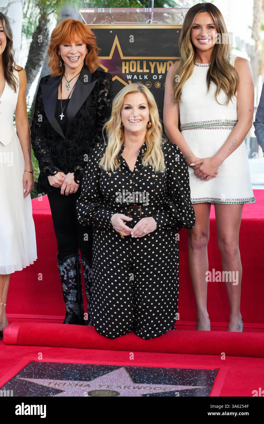 Reba McEntire, from left, Trisha Yearwood, and Carly Pearce pose with ...