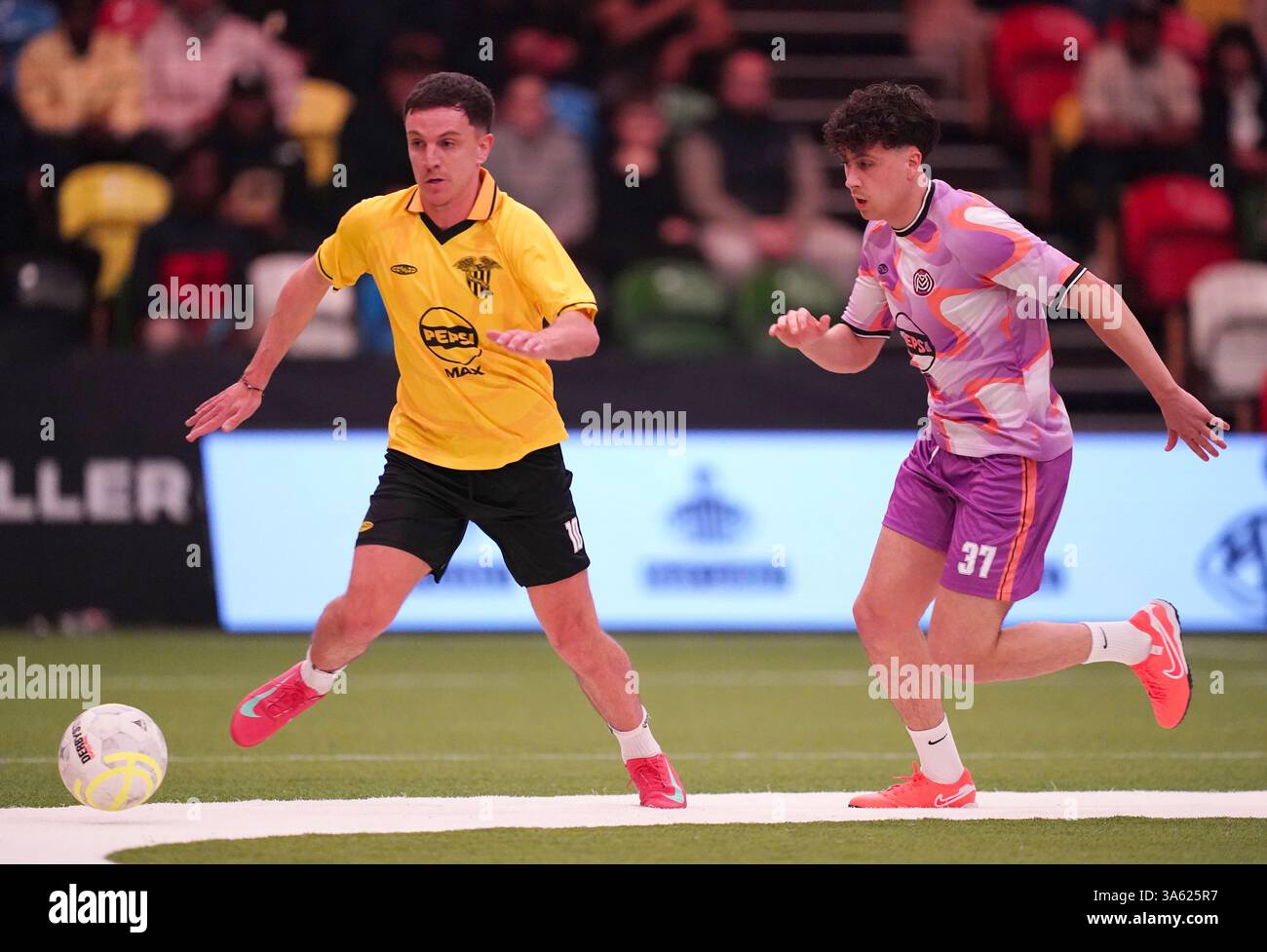 FC RTW's Josh Harrop (left) and MVPs United's Joe Edwards in action ...