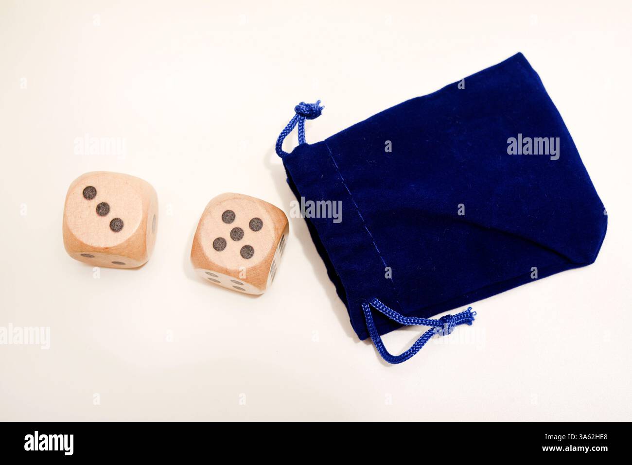 Dice on a white background. Large and small dice Stock Photo - Alamy