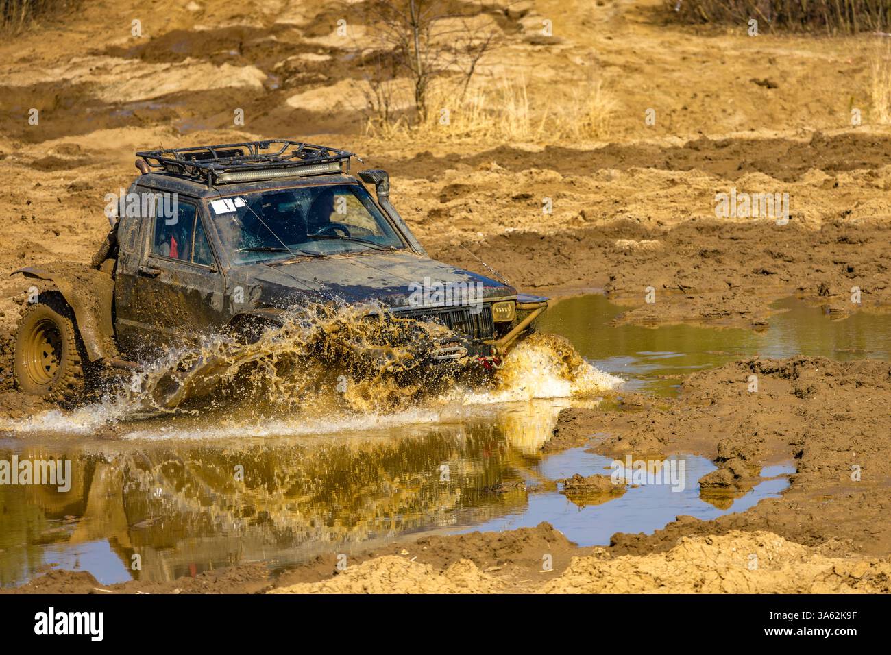 Extreme road conditions, difficult track for off-road vehicles, attempt ...