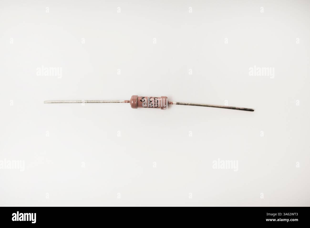 A brown resistor on a white background. The electronic component Stock ...
