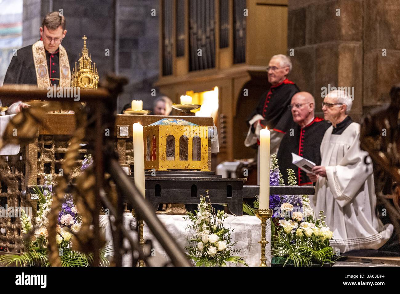 KERKRADE - Priests during a prayer vigil around the relics of St ...