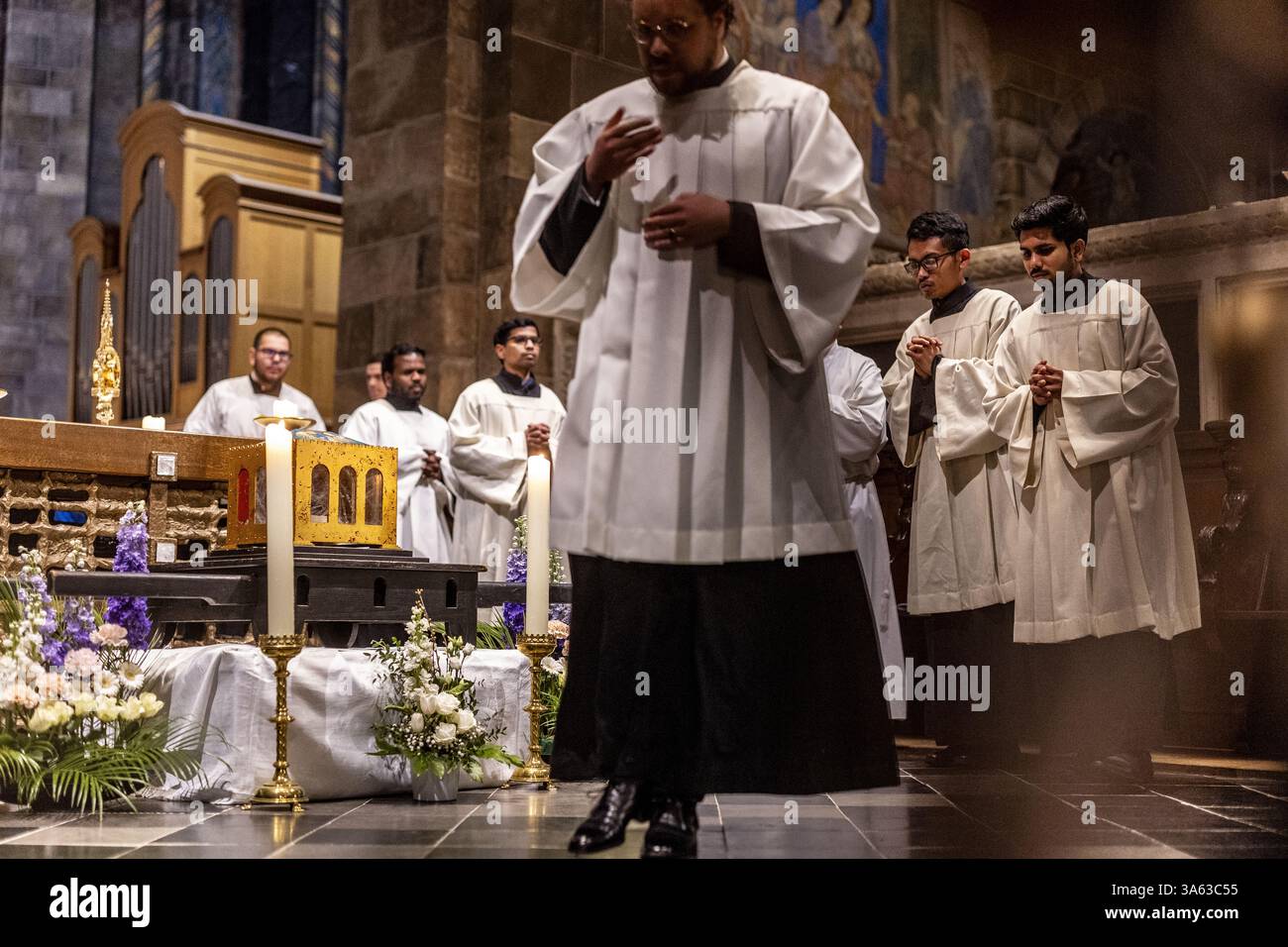 KERKRADE - Priests during a prayer vigil around the relics of St ...