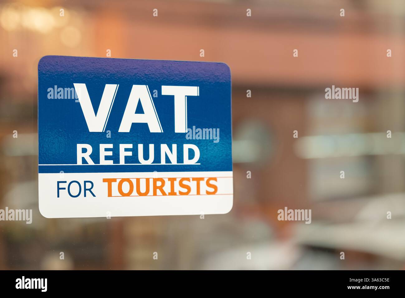 Close-up Label of VAT Refund for Tourist. VAT refund direction on a ...